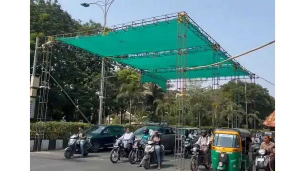 Surat Police Install Green Net Shades at Traffic Signals Amid Heatwave ...